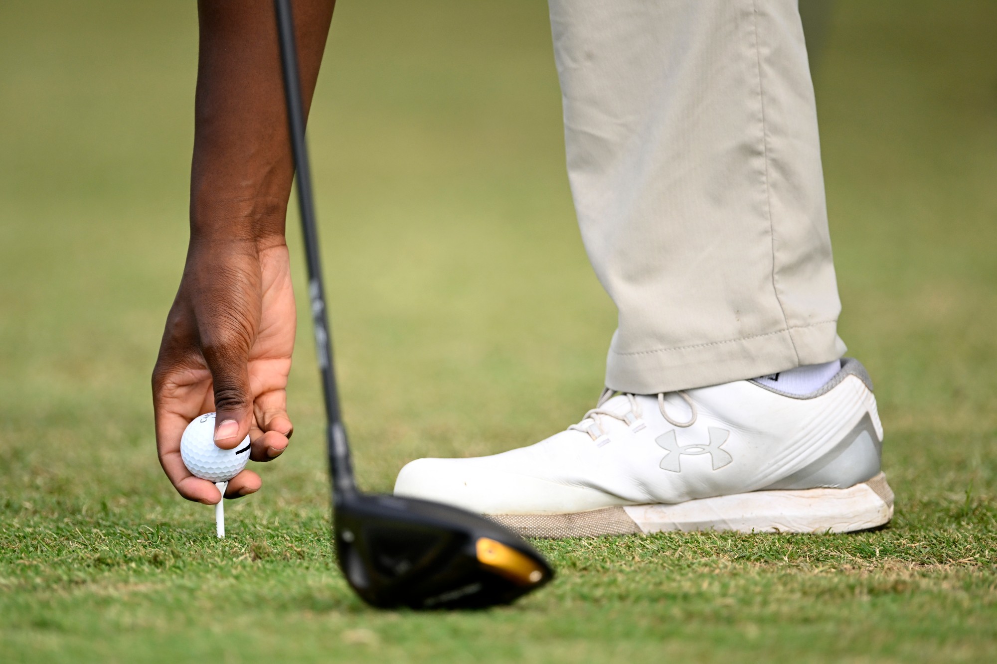 Teeing area rules: Does my entire ball need to be in the area?